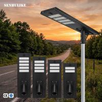 China Black Integrated Solar Street Light 200W 4 Modules LED IP65 Waterproof Aluminum Alloy Shell Built-in Lithium Battery Microwave Induction for sale