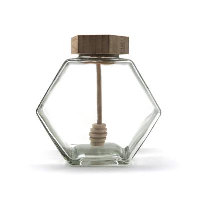 China Empty Hexagon Glass Honey Jar Pot Jar 12oz Capacity Wooden Bamboo Dripper for sale