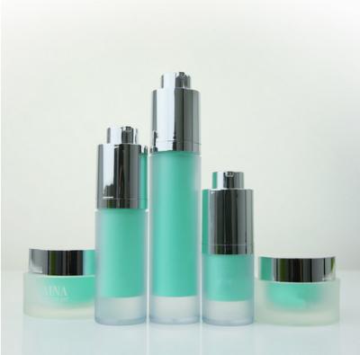 China Frosted Skin Care Serum Toner Plastic Lotion Bottles Round Pump Glass Bottles 50ml for sale