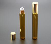 China Customized Packaging Gold Plastic Massage Oil Roll On Bottle With Screw Up Caps for sale
