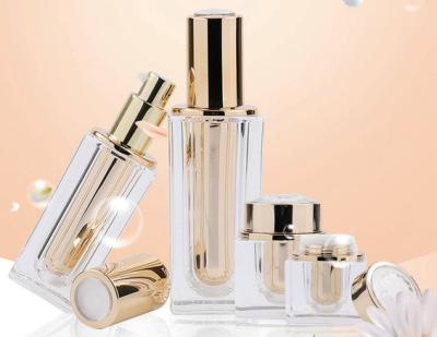 China 30ml Luxury Empty Gold Acrylic Spray Bottles Cream Jar For Serum Lotion for sale