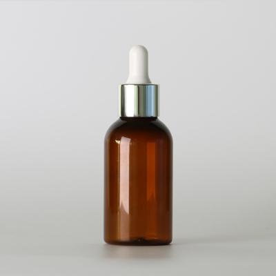 China 70ml Oil Pet Plastic Bottles Amber Color Refillable With Liquid Dropper Cap for sale