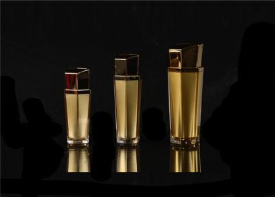 China 15ml 30ml 50ml 100ml Red Cosmetic Lotion Bottle With Shiny Goldern Pump And Clear Plastic Cap for sale