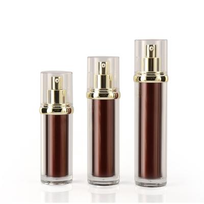 China Brown Plastic Pump Bottles Double Walled Plating Plastic Cosmetic Bottles for sale