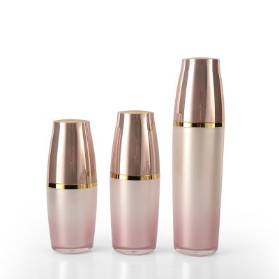 China Frosting Airless Cosmetic Bottles 30ml 50ml 120ml Pink Plastic Plating Round Lotion Bottle for sale