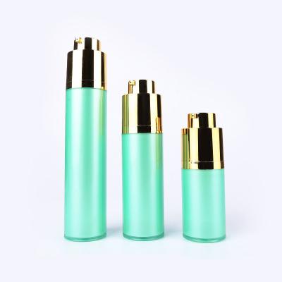 China 15ML 30ML 50ML green plastic PP twist up gold pump OEM round airless bottles cosmetic for sale