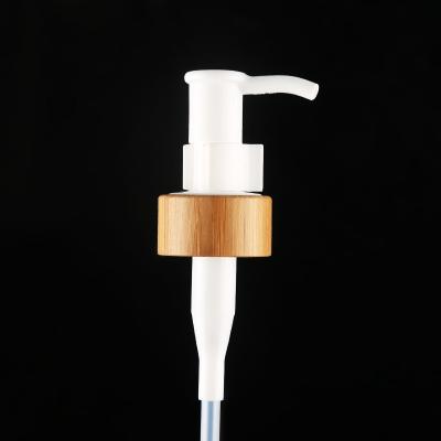 China 1.6ml Output 360 Degree Dispenser Airless Bamboo Lotion Pump for sale