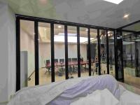 China Black Soundproof Aluminum Bifold Doors with 5-Year Warranty and Custom Sizes for Residential & Commercial Use for sale