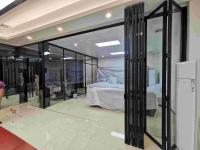 China Black Soundproof Aluminum Bifold Doors with 5-Year Warranty and Custom Sizes for Residential & Commercial Use for sale
