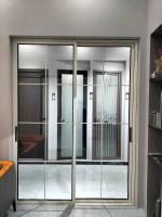 China Weatherproof Aluminium Sliding Fly Screen Door with 5-Year Warranty and Customizable Sizes for Home and Office for sale