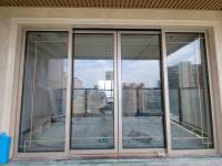 China Weatherproof Aluminium Sliding Fly Screen Door with 5-Year Warranty and Customizable Sizes for Home and Office for sale