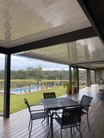 China Industrial Outdoor Aluminium Pergola with 5-Year Warranty and Custom Powder Coating Thickness Options for sale