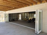 China Aluminum Folding Doors 1.0-2.0mm Frame with Powder Coating and Single/Double Glazed Glass for Commercial Use for sale
