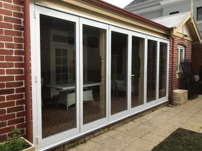 China WY-Tec Aluminum Folding Doors 1.0mm-2.0mm Thickness with Single/Double Glazed Glass for Commercial Use for sale