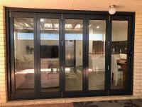 China 1.0mm-2.0mm Aluminum Folding Doors with Powder Coating - Manual/Automatic Operation & 5-Year Warranty for sale