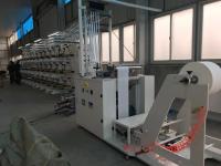 China Adjustable Speed Diaper Hook Slitting and Rewinding Machine with 22 kW Motor and 600 mm Rollers for sale