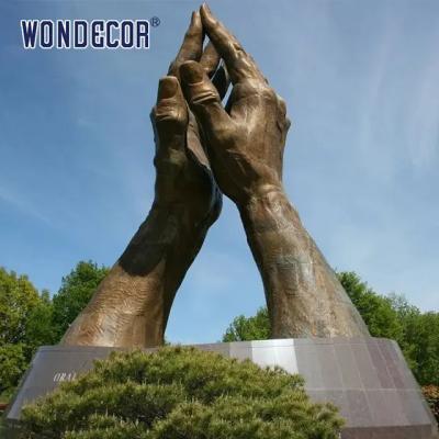China Large outdoor decoration casting prayer hands Bronze sculpture for sale