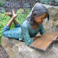 China Customized outdoor garden decoration, life-size bronze statue of a girl reading on her stomach for sale