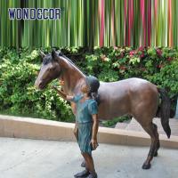 China Custom Life Size A Bronze Statue Of A Girl Playing With Her Horse Friend for sale