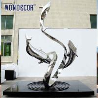 China Large outdoor metal art abstract marine animal dolphin and ribbon stainless steel sculpture for sale