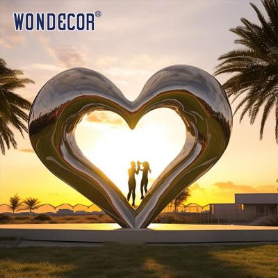 China Large outdoor square modern abstract geometric hollow heart-shaped stainless steel sculpture for sale