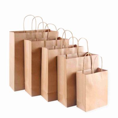 China Wholesale Khaki Color Christmas Kraft Paper Bags For Clothing Packaging for sale