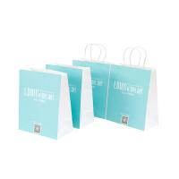 China Custom CMYK Shop Packaging Boutique Paper Bags Retail Recycled Paper Gift Bags for sale