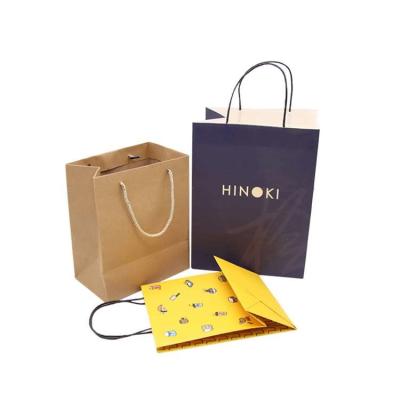 China Custom Unique Colour Printing Kraft Paper Shopping Bags Commercial for sale