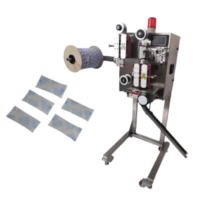 China Auto Deoxidant Antistaling Agent Silica Gel Desiccant Sachet Pouch Dispenser Bag Insert Feeder Machine for sale