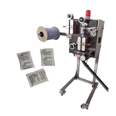 China Improve Production Capacity and Reduce Labor Costs with Desiccant Inserter Machine from Changsheng Packaging Machinery for sale