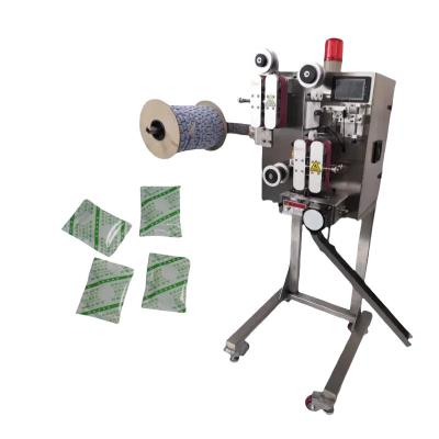 China Automatic Food Deoxidizer Delivery Machine Desiccant Dispenser Machine for sale