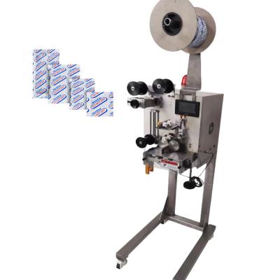 China Single Phase 50HZ 60HZ Desiccant Inserter Machine 220 Bags/Min High Speed for sale