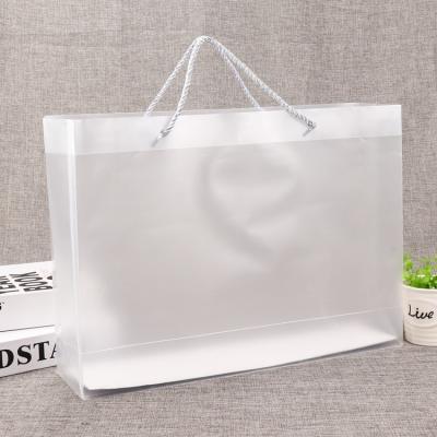 China Gifts XYDAN BAG PP Frost Transparent Shopping Bag Pvc Fashion Popular 100% Eco Handbag Clear Organza Gift Bag Shopping With Logo for sale