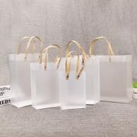 China XYDAN Plastic Bags Shopping Transparent PP Gift Bags For Packing Medium Size Handled Style for sale