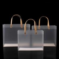 China Soft Loop Handle Pp Plastic Frosted Shopping Tote Bag with Letter Pattern and Rivet for sale