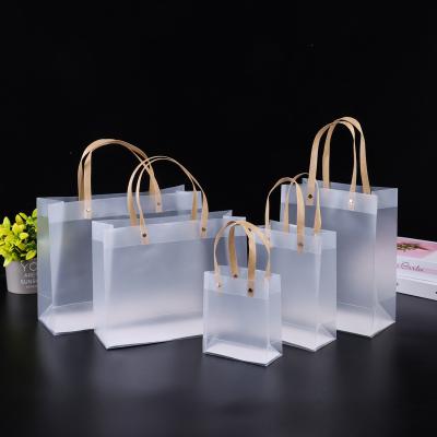 China XYDAN Frosted Rigid Pvc Transparent Tote Bag with Soft Loop Handle Striped Pattern for sale