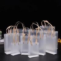 China XYDAN Frosted Rigid Pvc Transparent Tote Bag with Soft Loop Handle Striped Pattern for sale