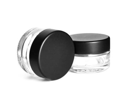 China 1.58in Black Glass Child Proof Jar 1 Oz Jars With Lids For Flower Food for sale