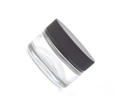 China 1oz Child Resistant Clear Black Glass Jars Child Resistant Glass Concentrate Jar for sale