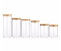 China 16oz Wooden Lid Glass Jar Clear Herb Storage Jar Suction High Borosilicate Glass for sale