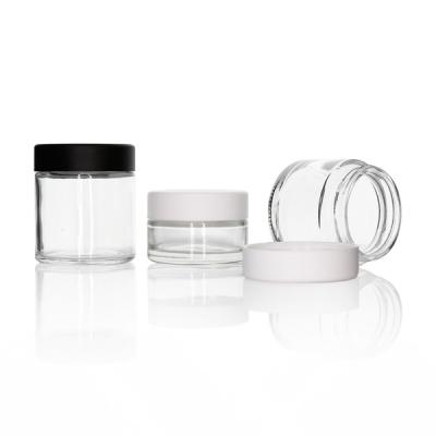 China 60ml Glass Child Resistant Jars Black Cap Concentrate Clear Glass Bottles Flower Packing for sale