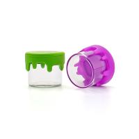 China Mini Silicone Concentrate Container Wide Neck Borosilicate Glass Jar With Lid for sale