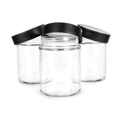 China 30ml-300ml Glass Child Resistant Jars Glass Flower Packing Containers Plastic Wood Lids for sale