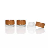 China 5ml Child Resistant Glass Jar 5ml custom child proof glass container  wood lid concentrate glass container for sale
