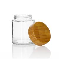 China 2oz 3oz 4oz Wooden Lid Glass Jars Childproof Air Tight Food Storage Containers for sale