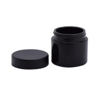 China 1oz 2oz Round Base Smell Proof Glass Jar Flower Packaging for sale