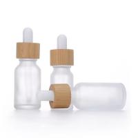 China Boston Round Small Glass Dropper Bottles 30ml 1 Oz Dropper Bottles Child Resistant for sale