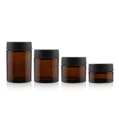China 1oz 2oz 3oz 4oz Child Resistant Glass Jar Amber Empty Glass Bottle for sale