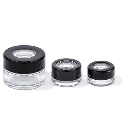 China Child Resistant Stash Jar 3.5g Transparent Glass Flower Jar With Magnifying Glass Lid for sale