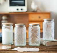 China Vintage Relief Kitchen Sealed Glass Storage Jar Grain And Miscellaneous Grain Sealed Jar for sale